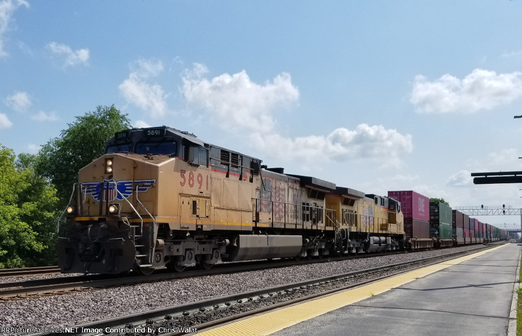 UP 5891 leads a west bound stack train